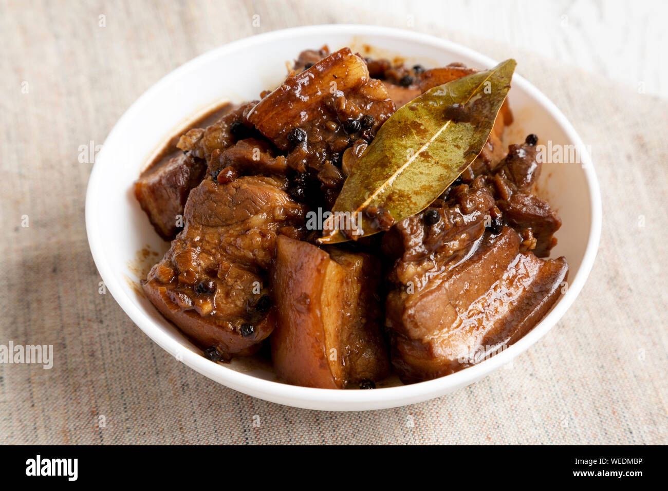 Homemade Filipino Adobo Pork in a bowl, side view. Close-up Stock Photo ...