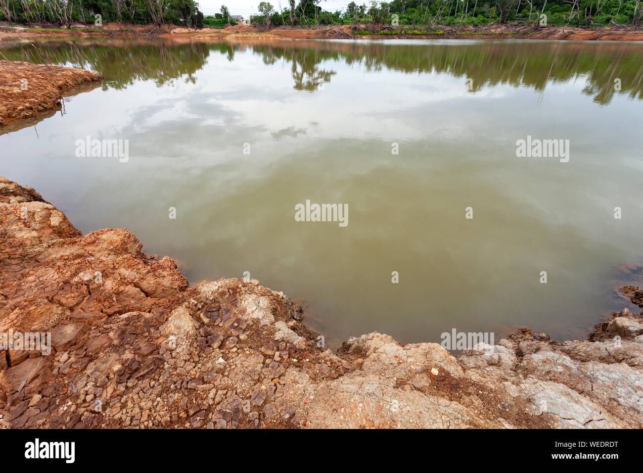 Dry soil with lake concept of environment background Stock Photo - Alamy