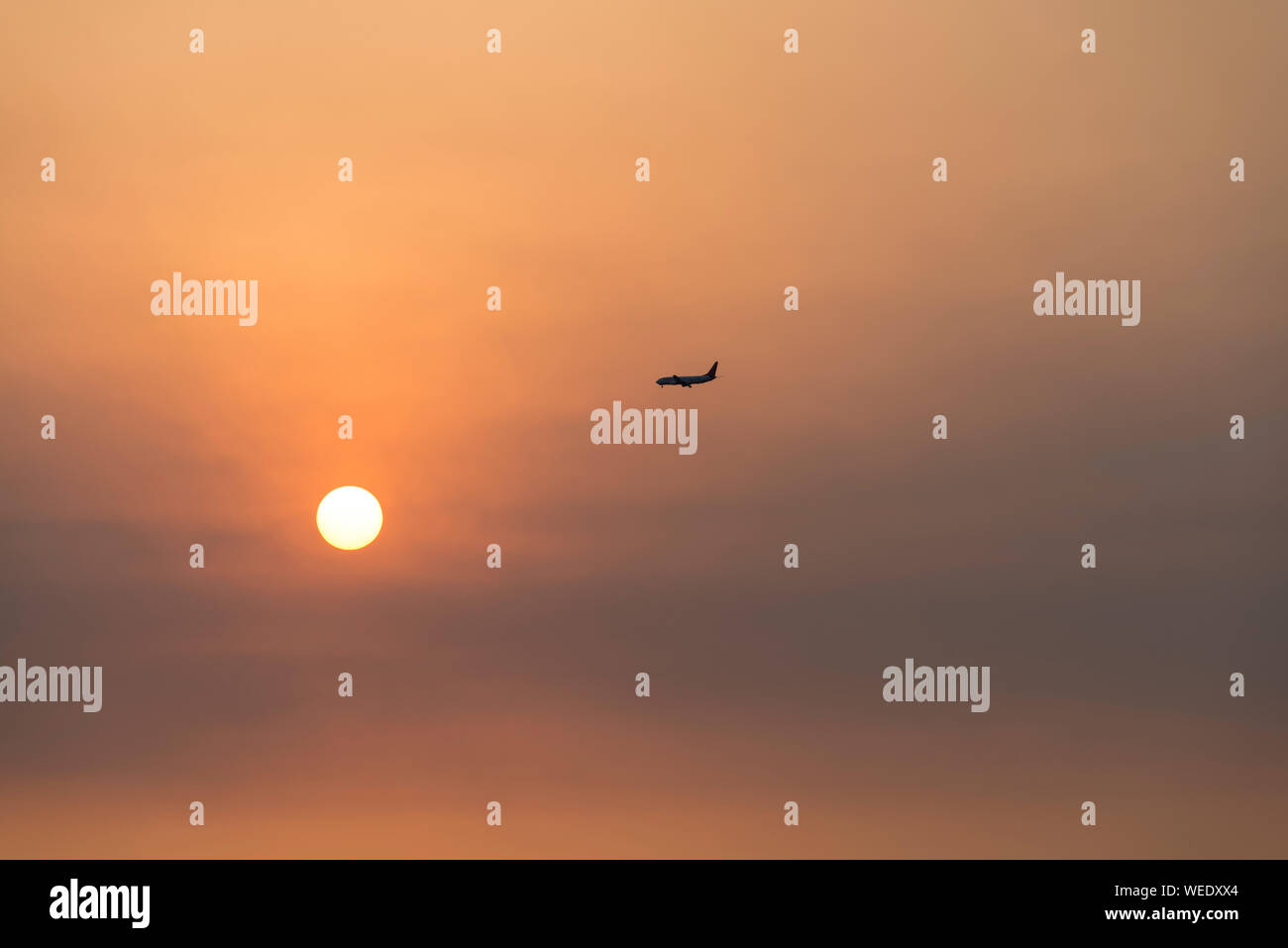 Distant silhouette of an airplane hi-res stock photography and images ...