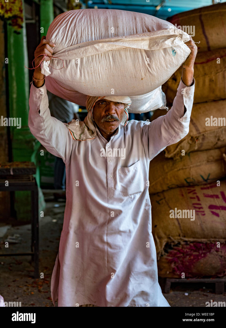 Big load man hi-res stock photography and images - Alamy