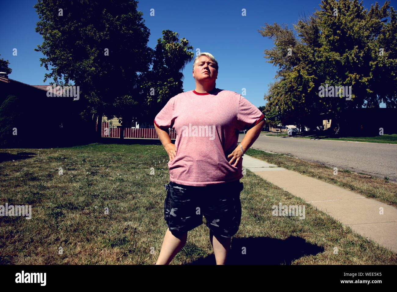 Woman back hands hips hi-res stock photography and images - Alamy