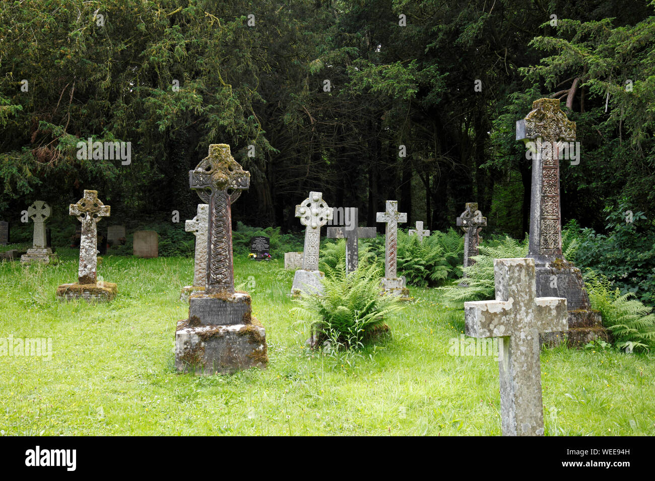Collection of Celtic crosses in an old churchyard. Powys Stock Photo ...