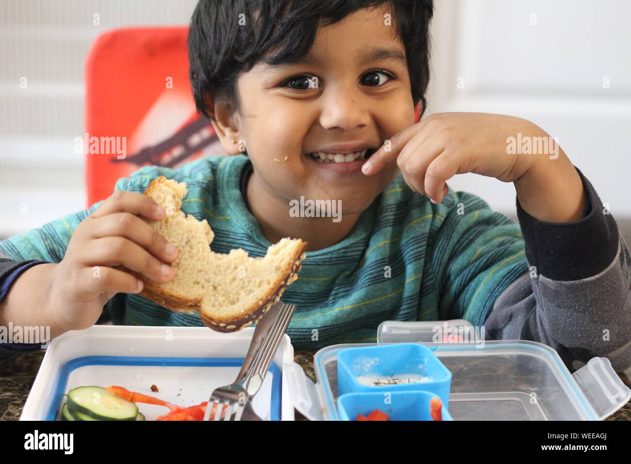 Smiling while eating hi-res stock photography and images - Alamy