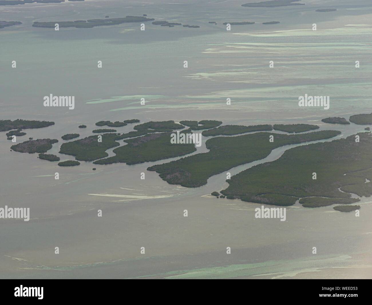 Aerial view of the Florida Keys at the strait of Florida, seen from an ...