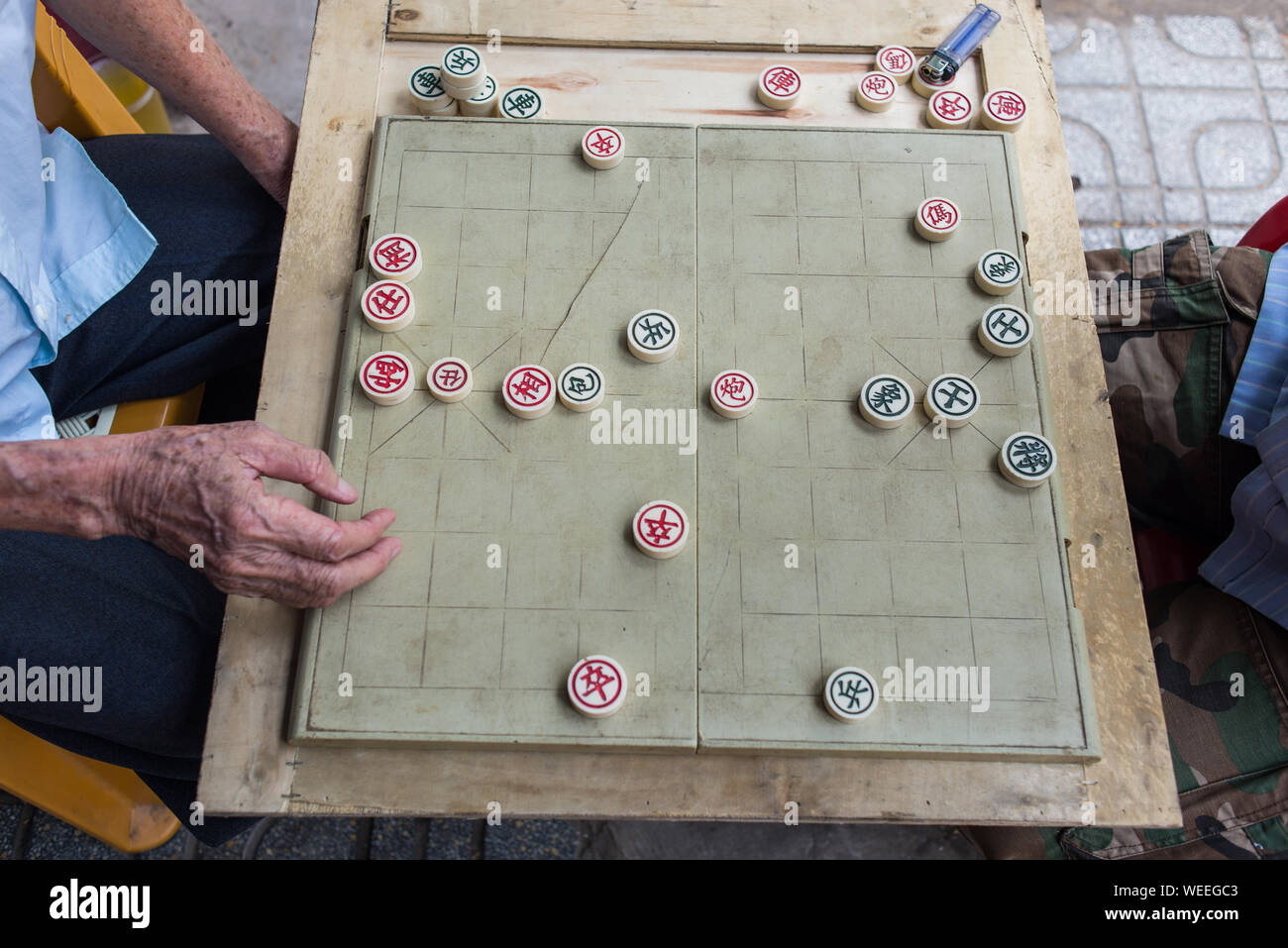Top view photo of Asian elderly people playing Chinese chest Stock ...