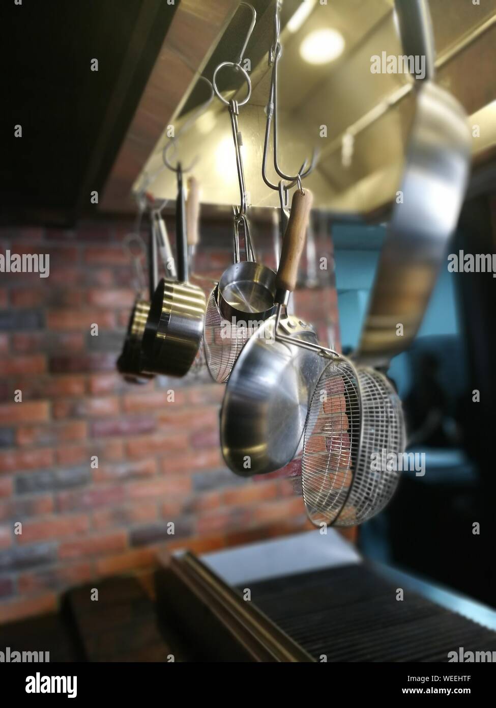 Hanging utensils hi-res stock photography and images - Alamy