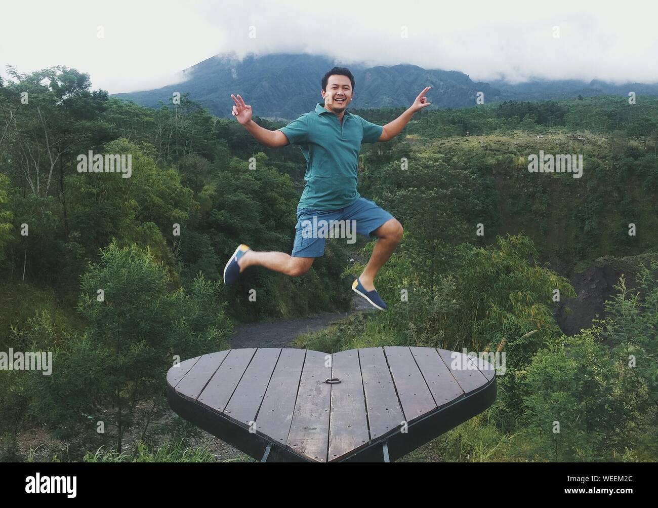 Jumping over trees hi-res stock photography and images - Alamy