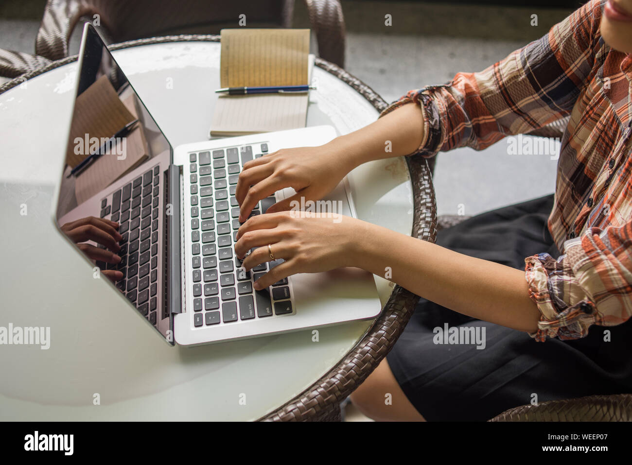 Close up photo of woman hand typing laptop keyboard Stock Photo - Alamy