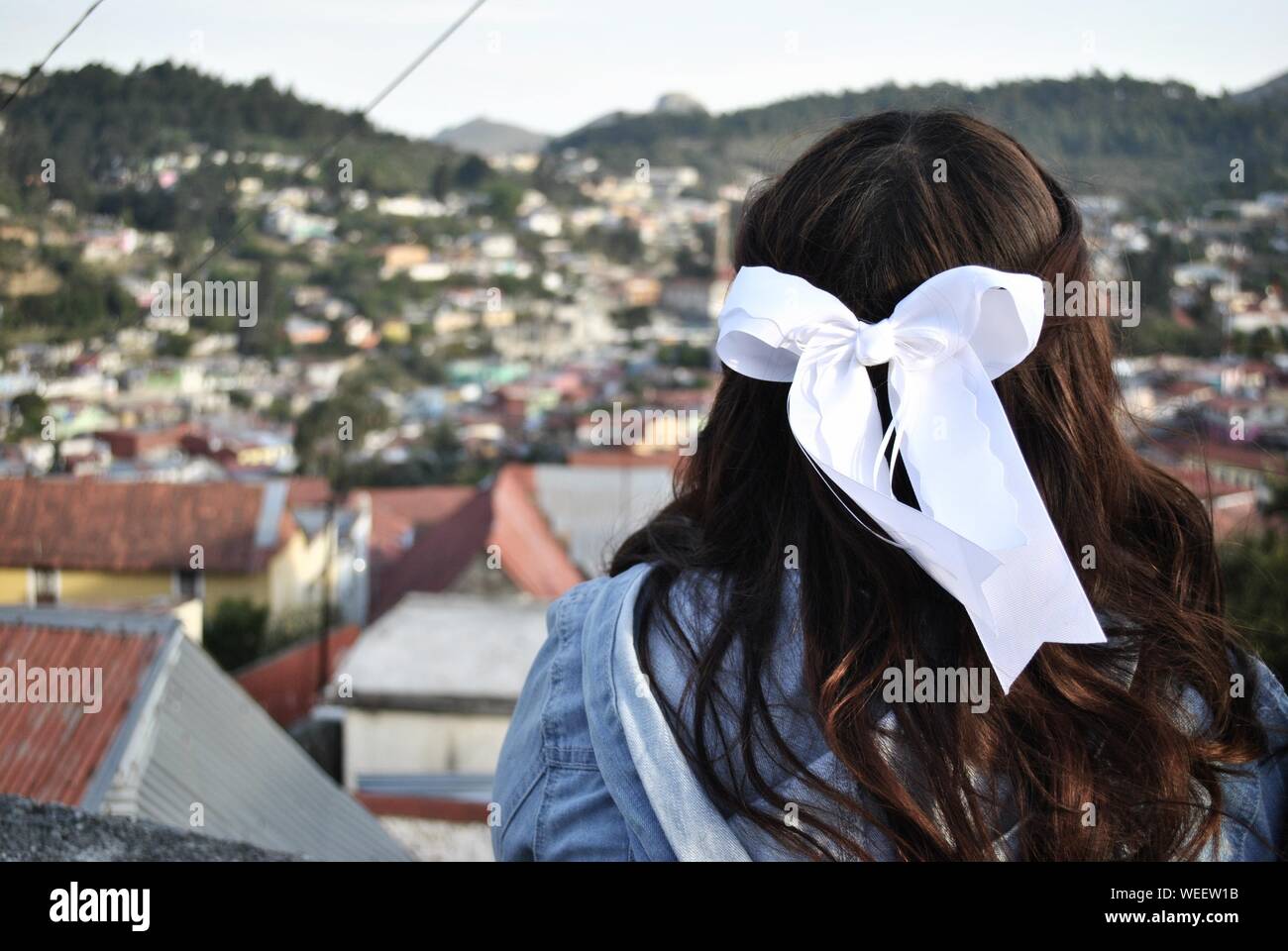 Wearing hair ribbon hi-res stock photography and images - Alamy