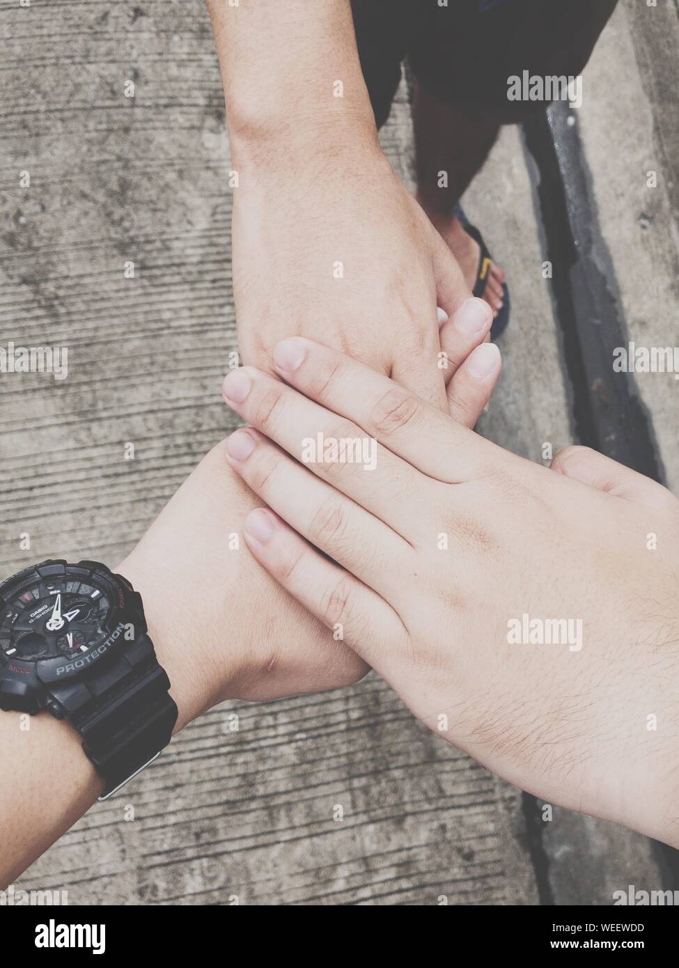 Close Friends Touching Hands High Resolution Stock Photography and ...