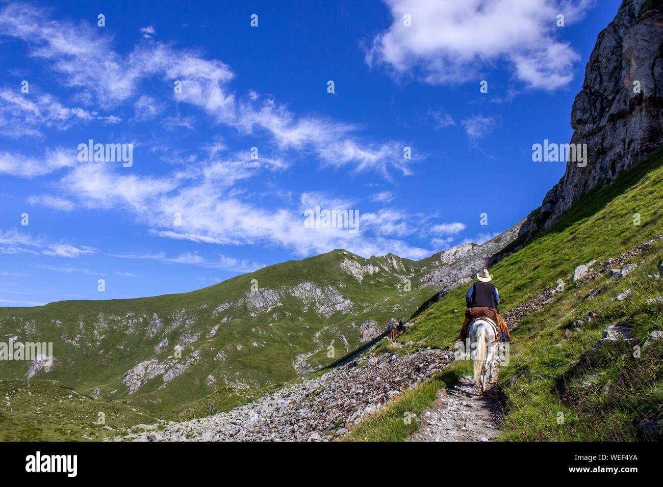 Riding on mountain hi-res stock photography and images - Alamy