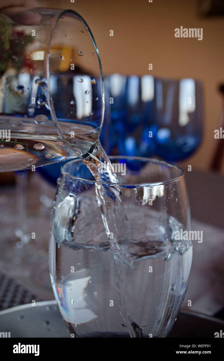 Pouring water into glass hi-res stock photography and images - Alamy