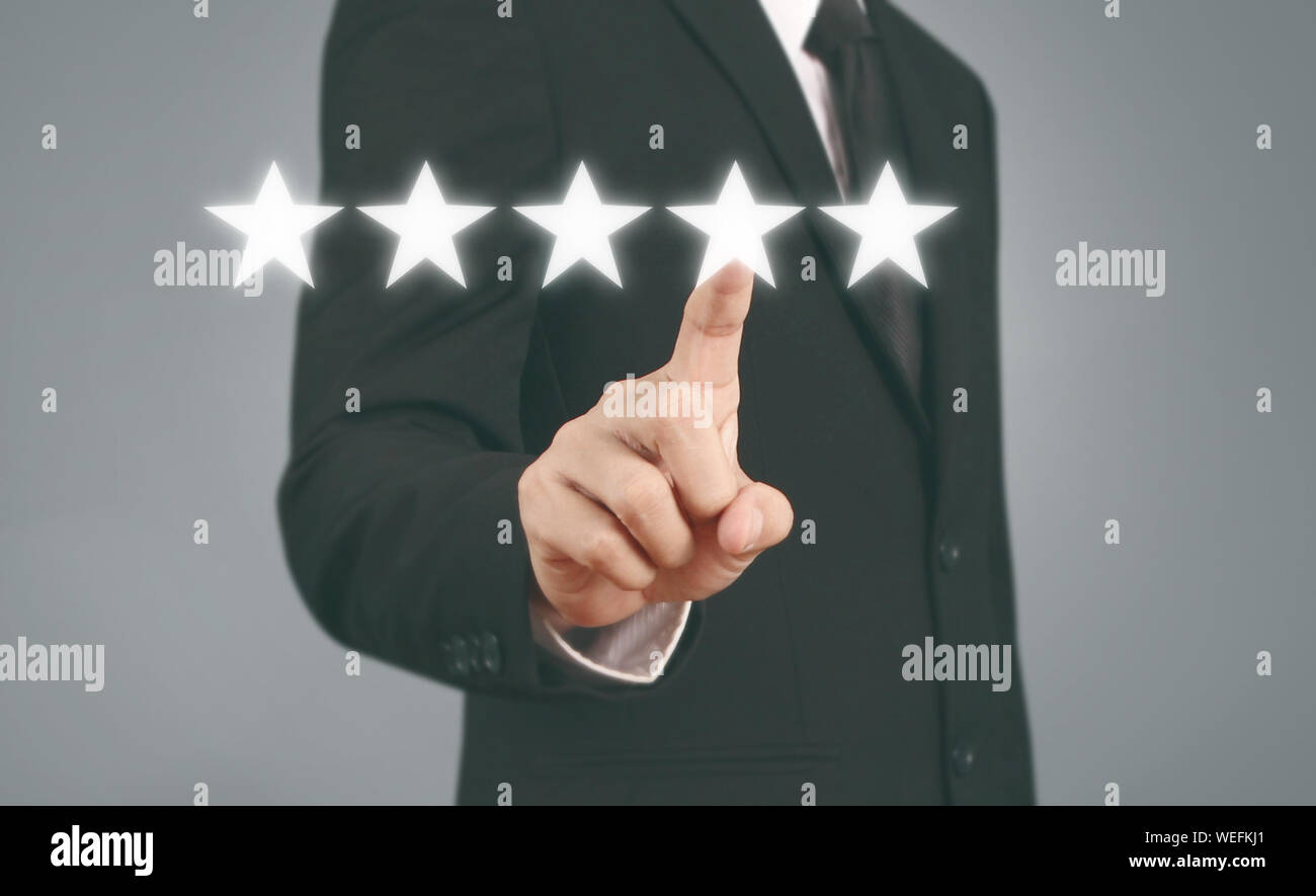 Businessman hand touching five hi-res stock photography and images - Alamy