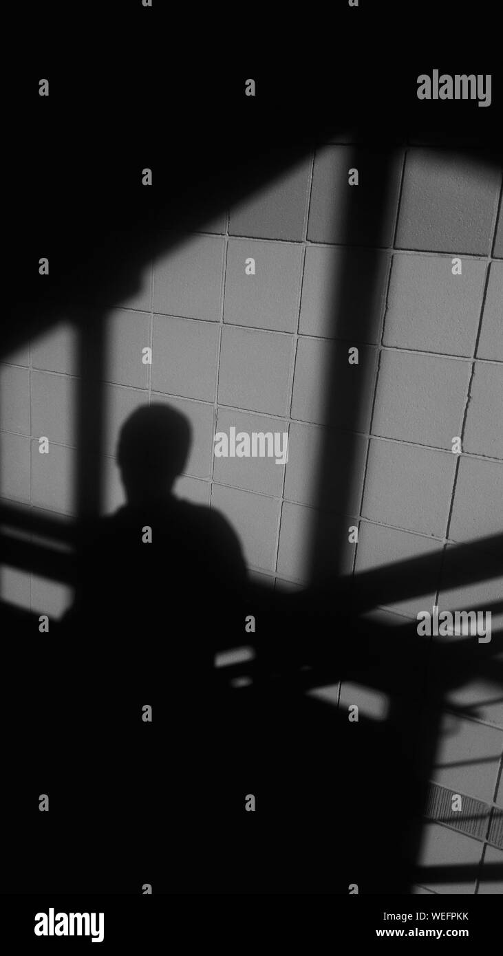 Man shadow wall silhouette Black and White Stock Photos & Images - Alamy