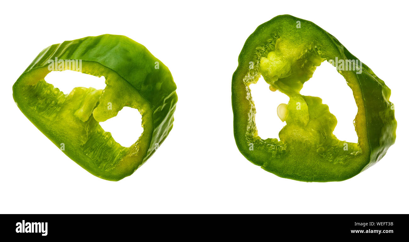 Fresh green chillies cut into rings. Isolated on white background Stock ...