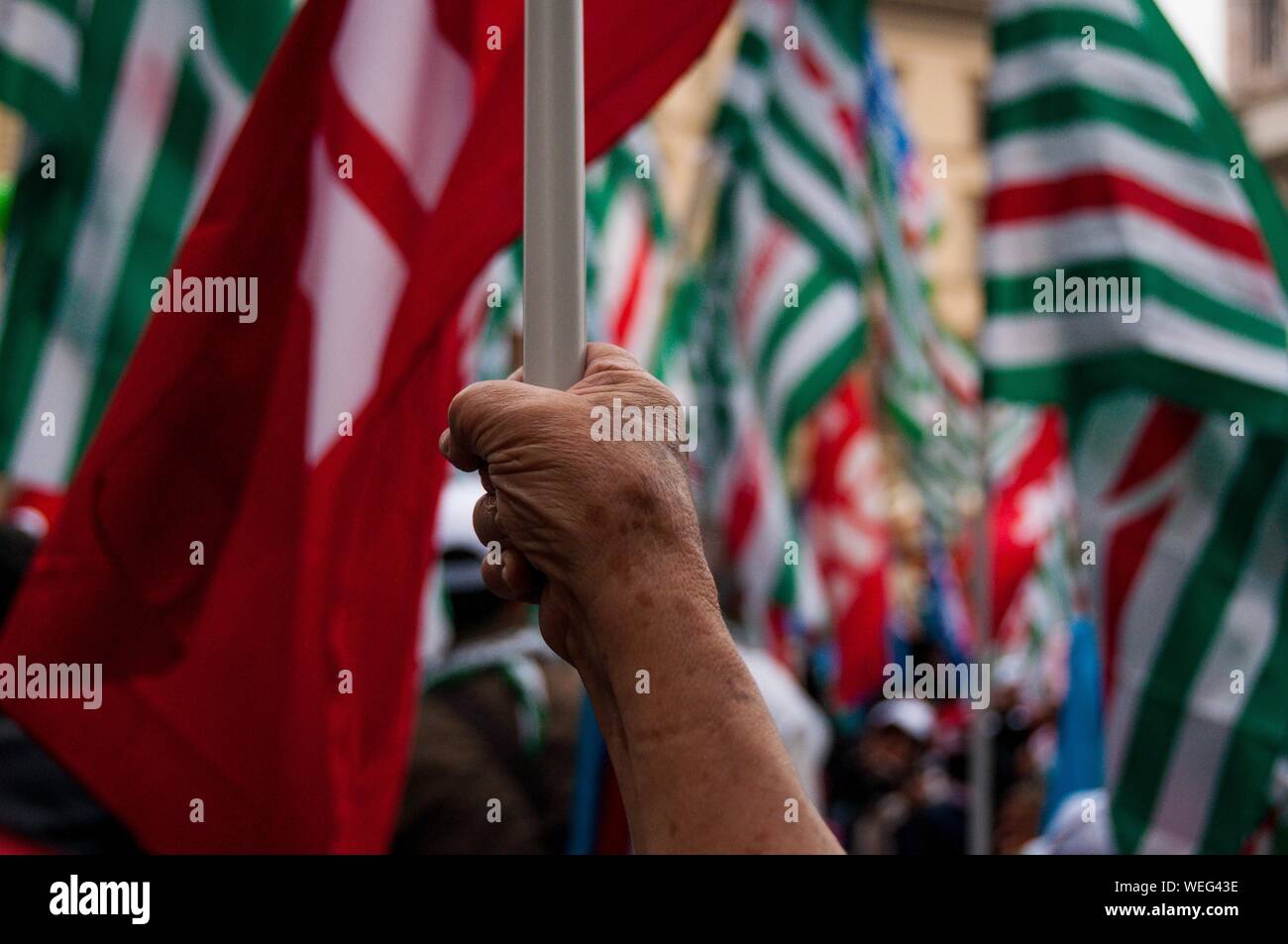 Hand Holding Flag High Resolution Stock Photography and Images - Alamy