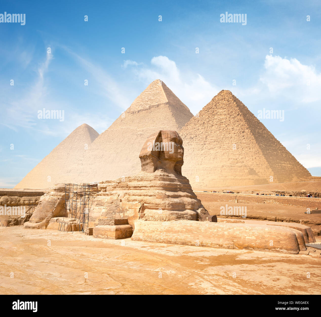 Great sphinx and pyramids under bright sun Stock Photo - Alamy