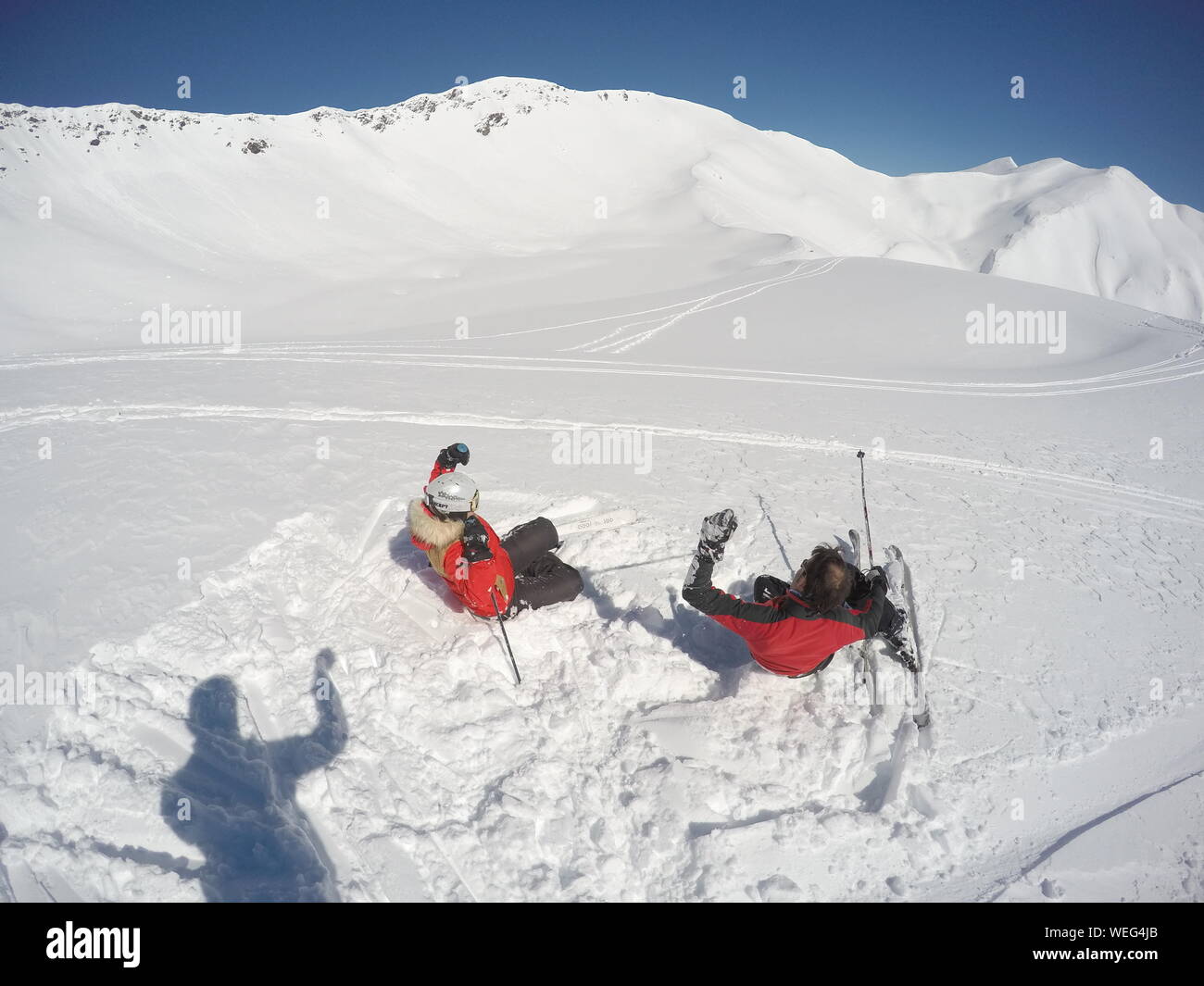 Two people on ski slope hi-res stock photography and images - Alamy
