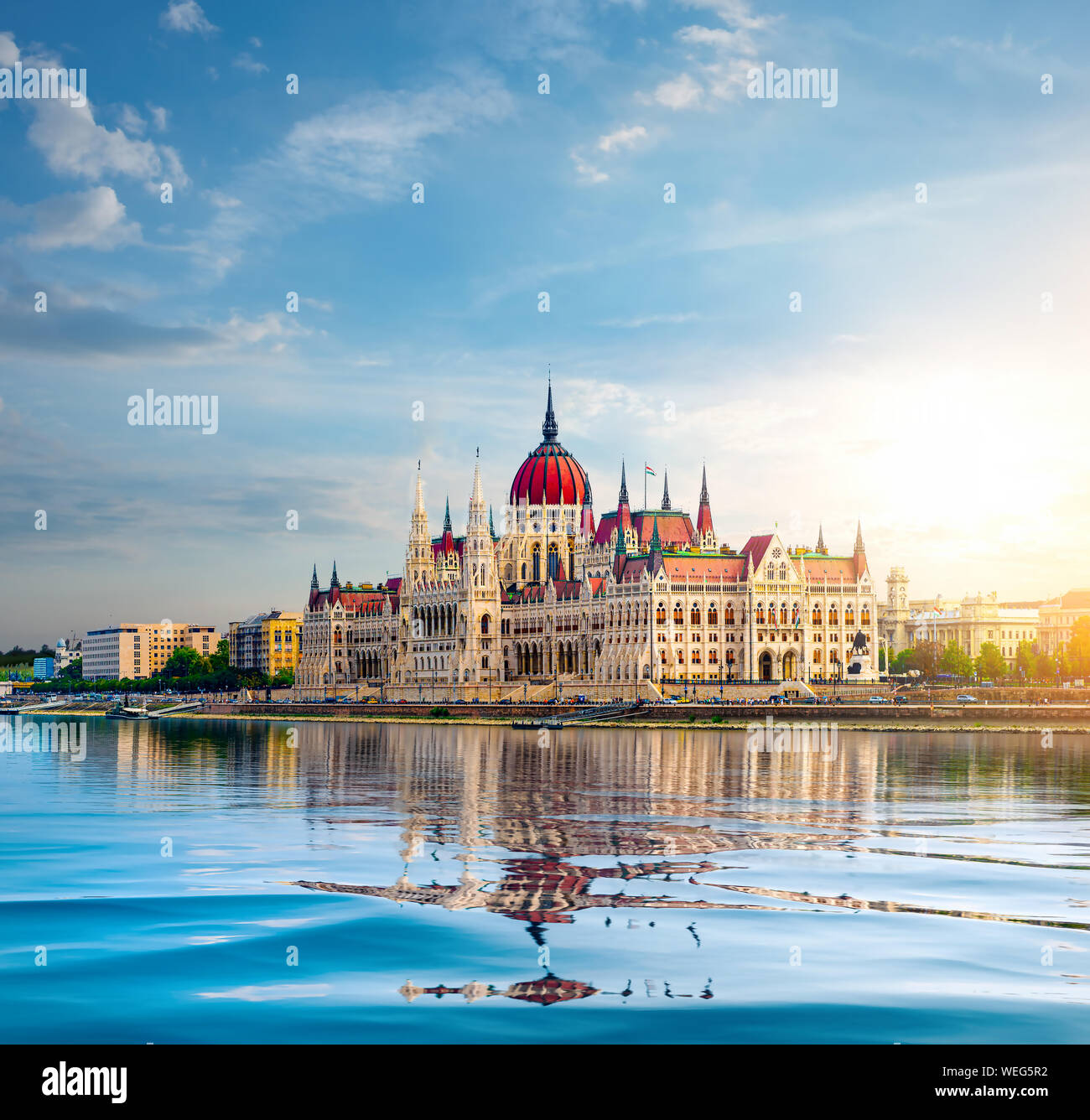 Sun over Parliament in Budapest at sunset, Hungary Stock Photo - Alamy