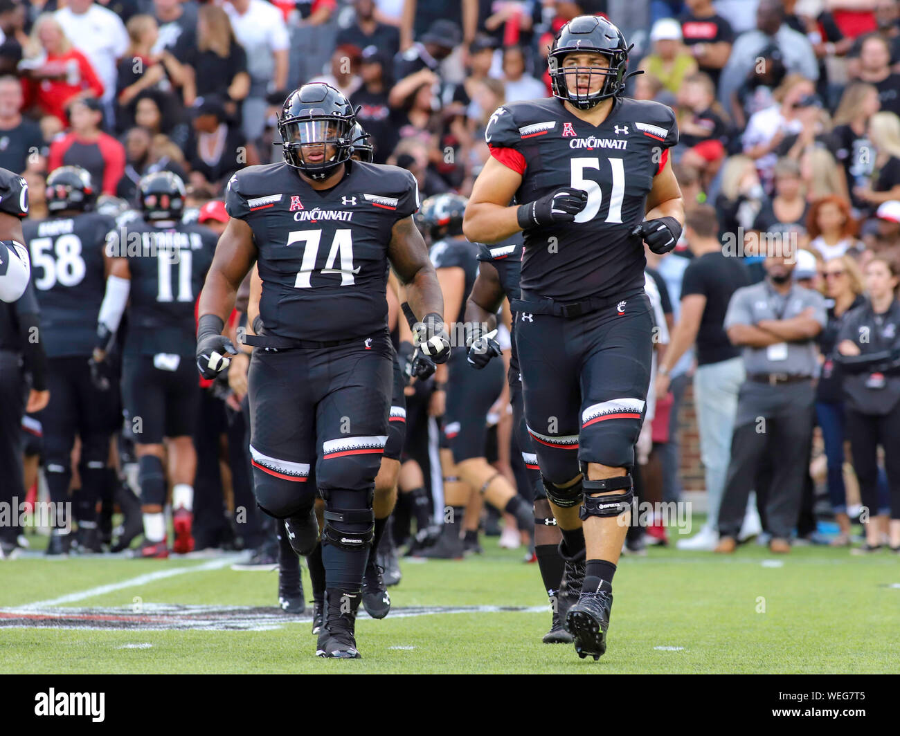 August 29, 2019: Cincinnati's Lorenz Metz (51) and Jeremy Cooper (74 ...