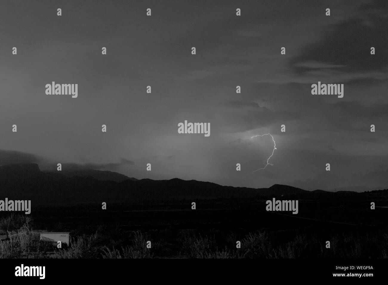 Lightning storm at night Stock Photo - Alamy