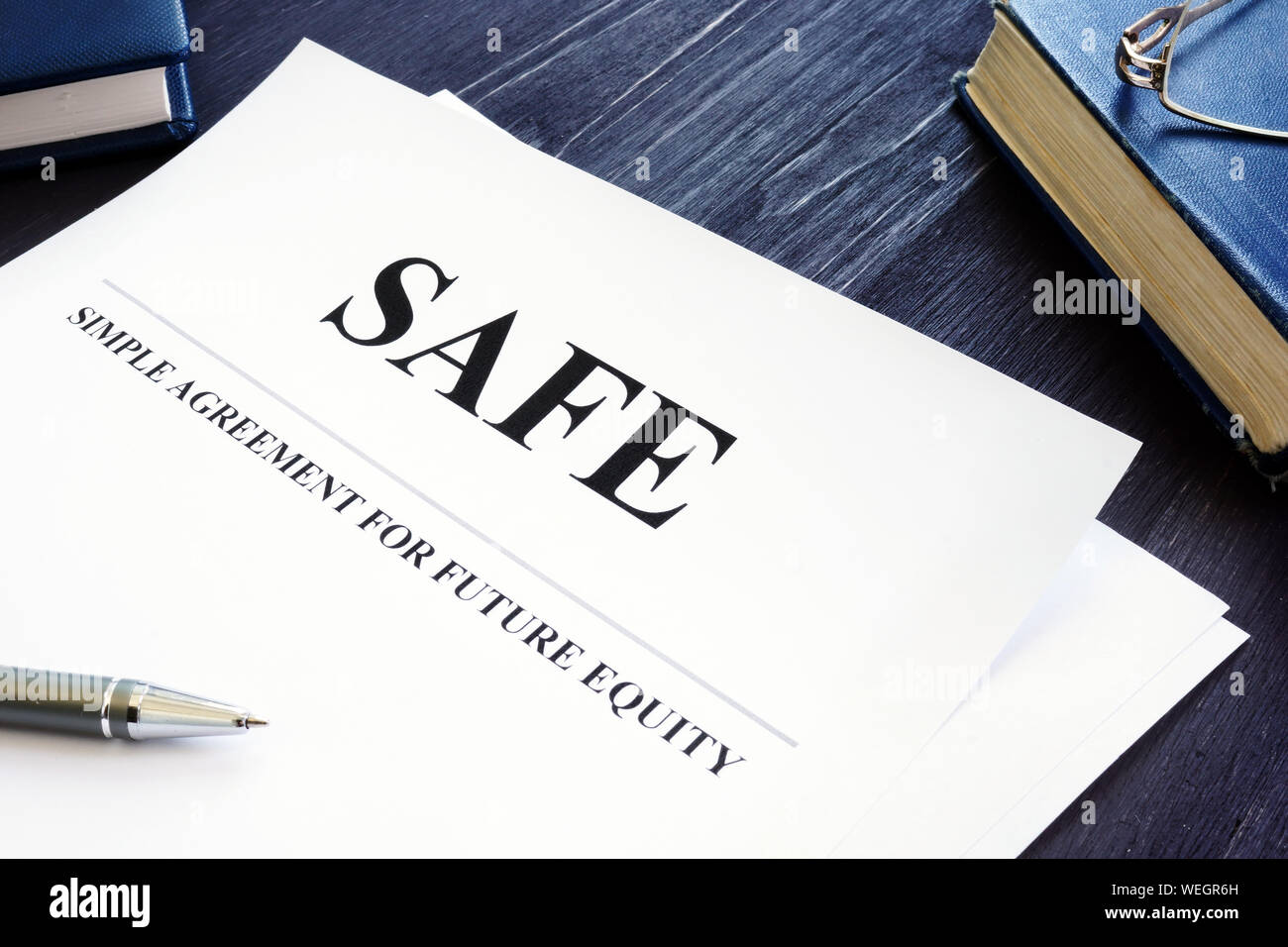 Simple agreement for future equity SAFE on the office desk Stock Photo ...