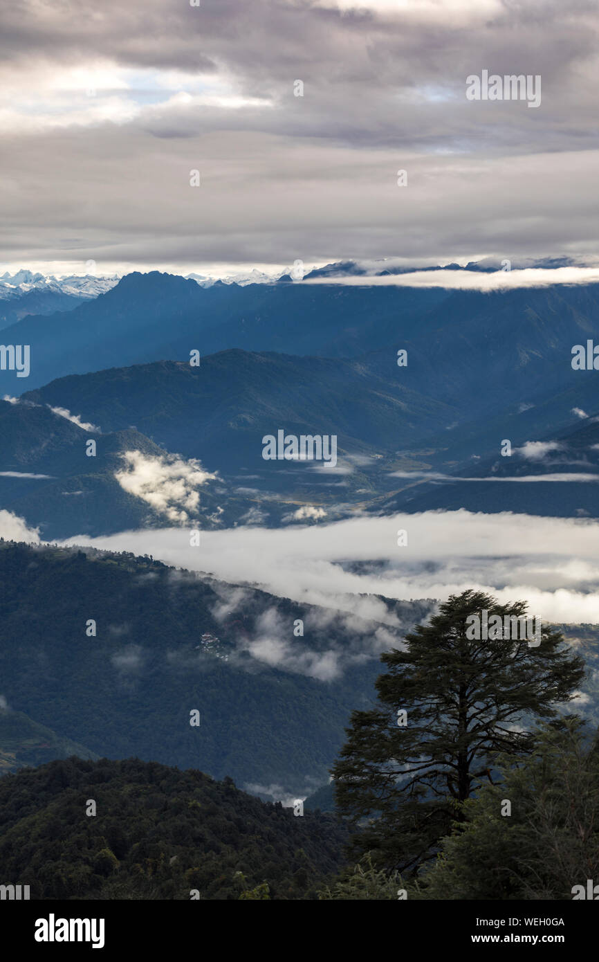 Mountains in Bhutan seen from Dochu La Stock Photo - Alamy