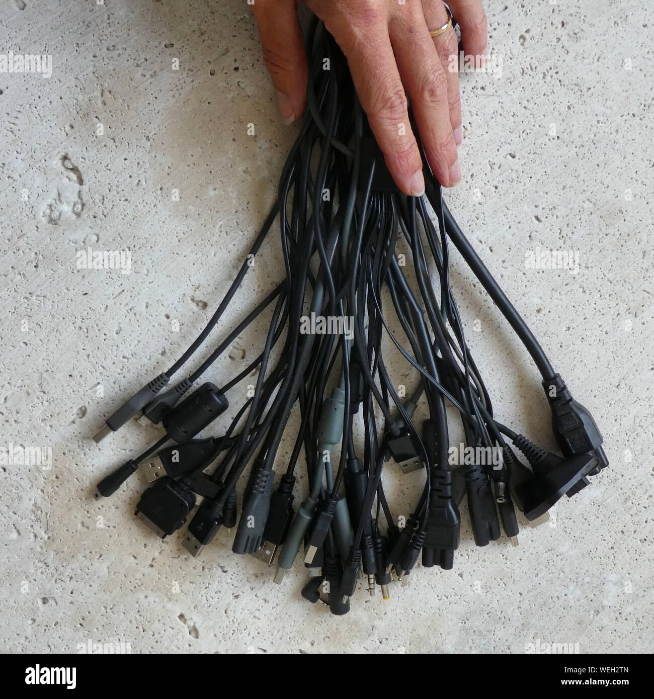 Hand Holding Cables High Resolution Stock Photography and Images - Alamy