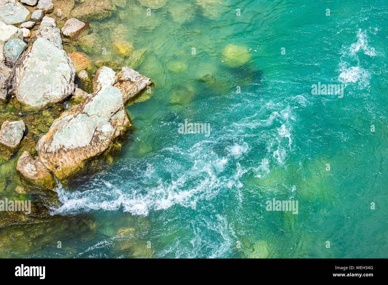 Top view stones in a mountain river Stock Photo - Alamy