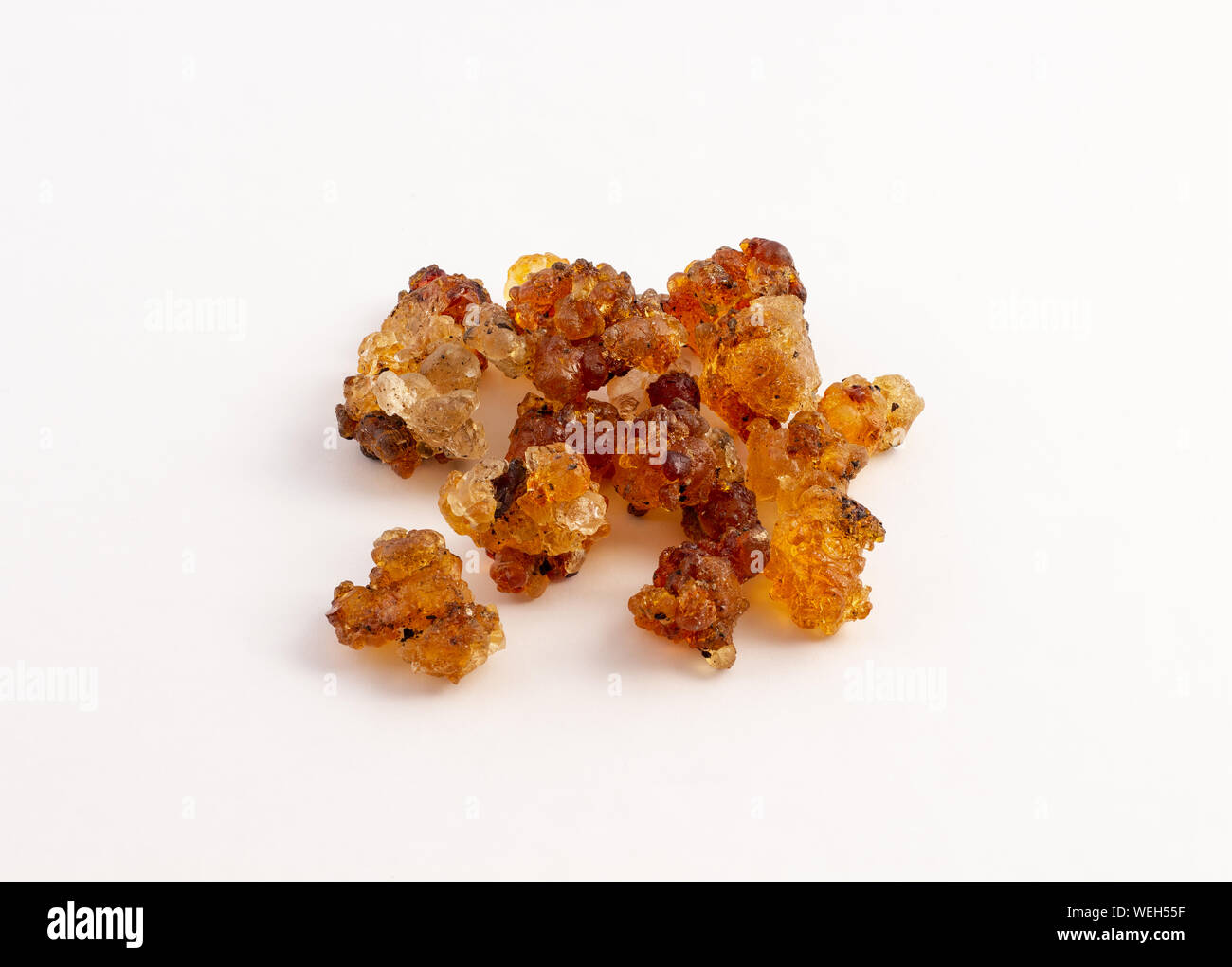 a group of peach gum on white background Stock Photo - Alamy