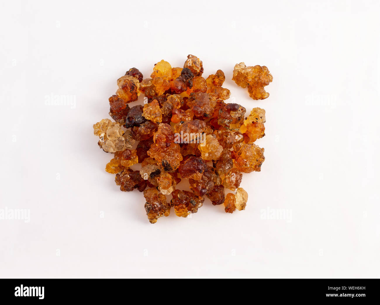 a group of peach gum on white background Stock Photo - Alamy