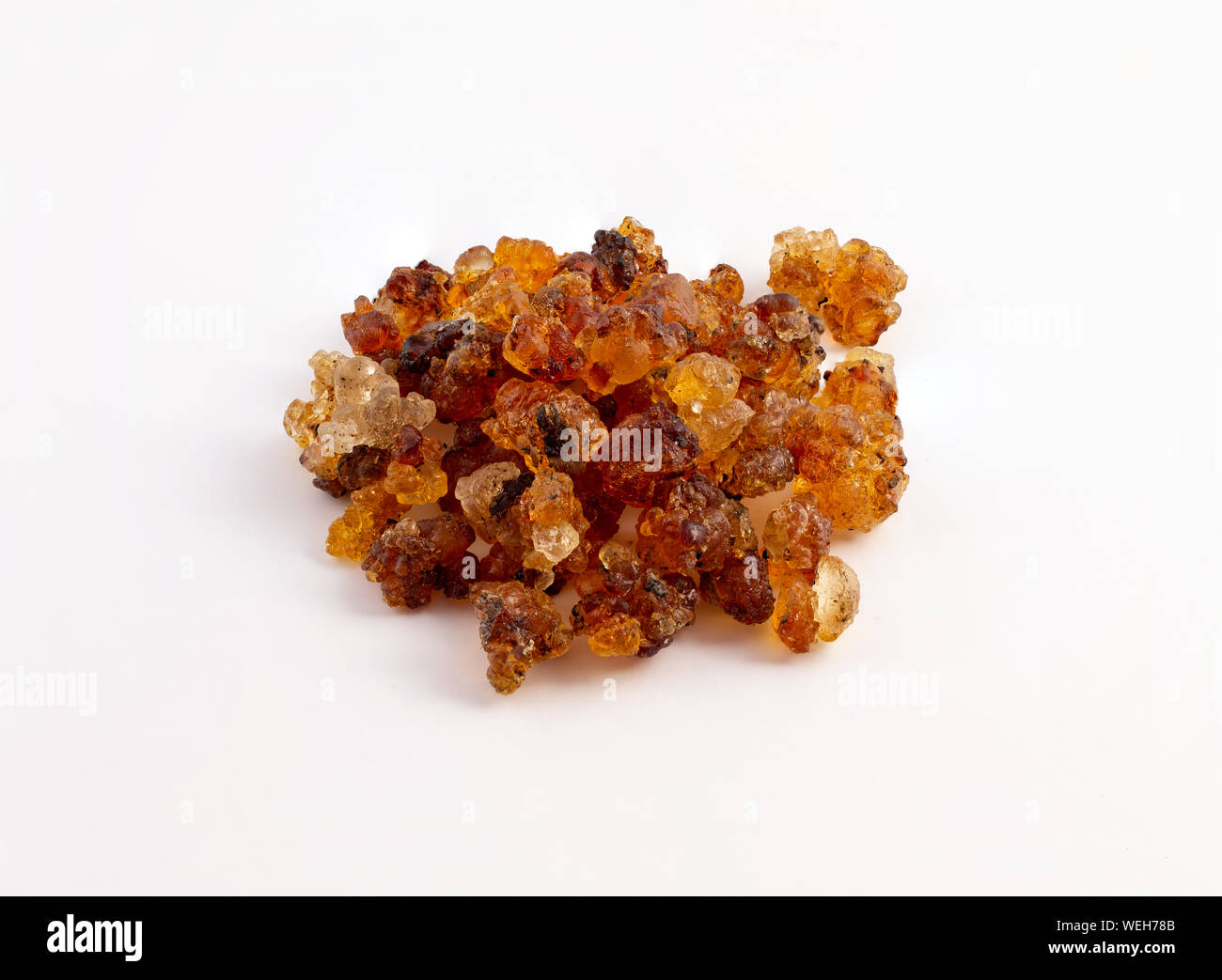 a group of peach gum on white background Stock Photo - Alamy