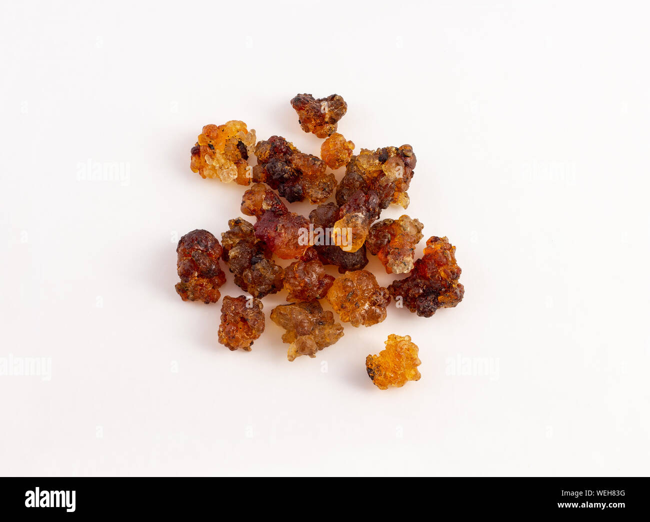 a group of peach gum on white background Stock Photo - Alamy