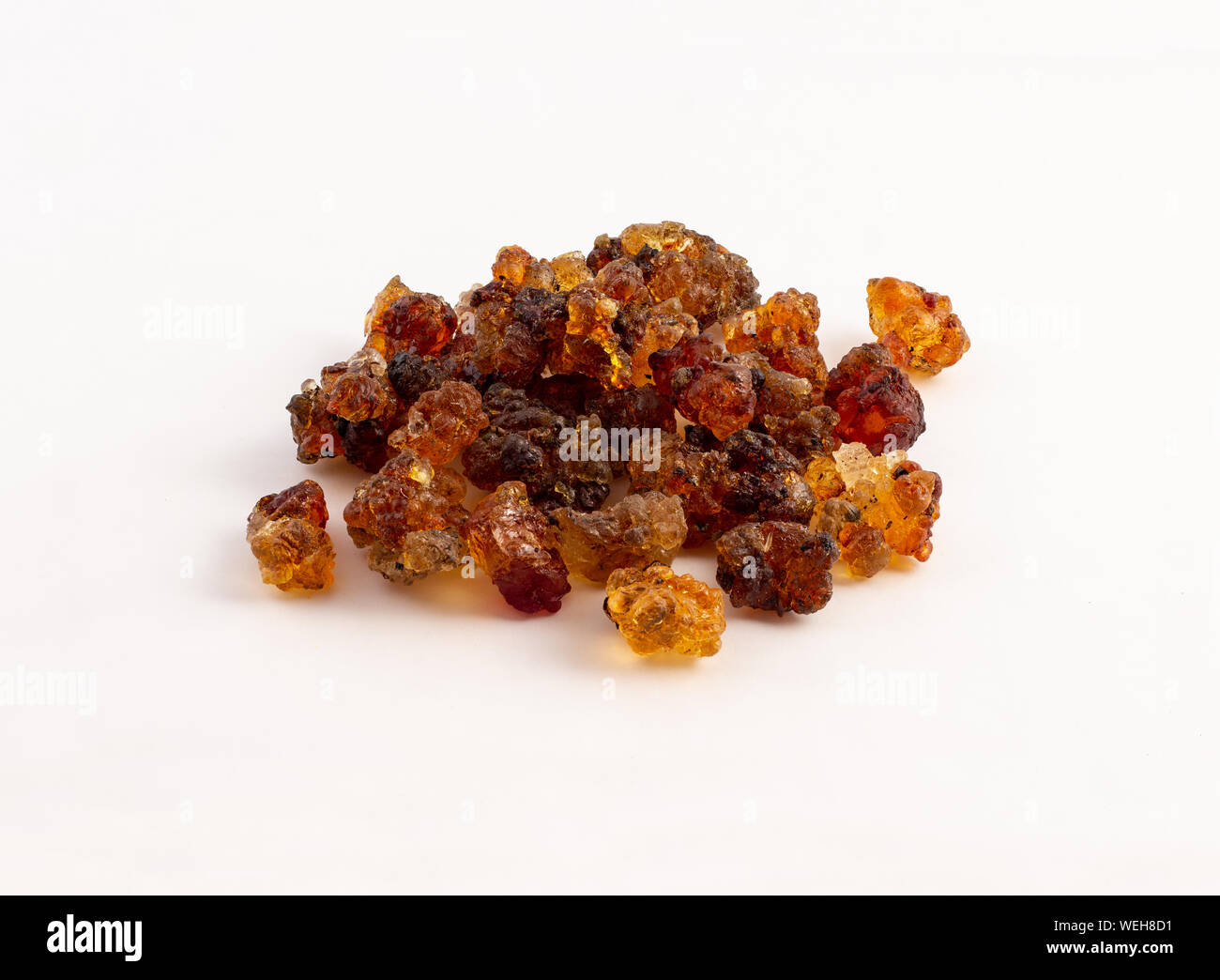 a group of peach gum on white background Stock Photo - Alamy