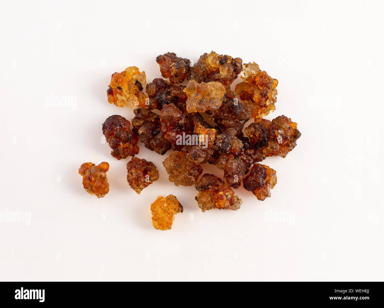 a group of peach gum on white background Stock Photo - Alamy