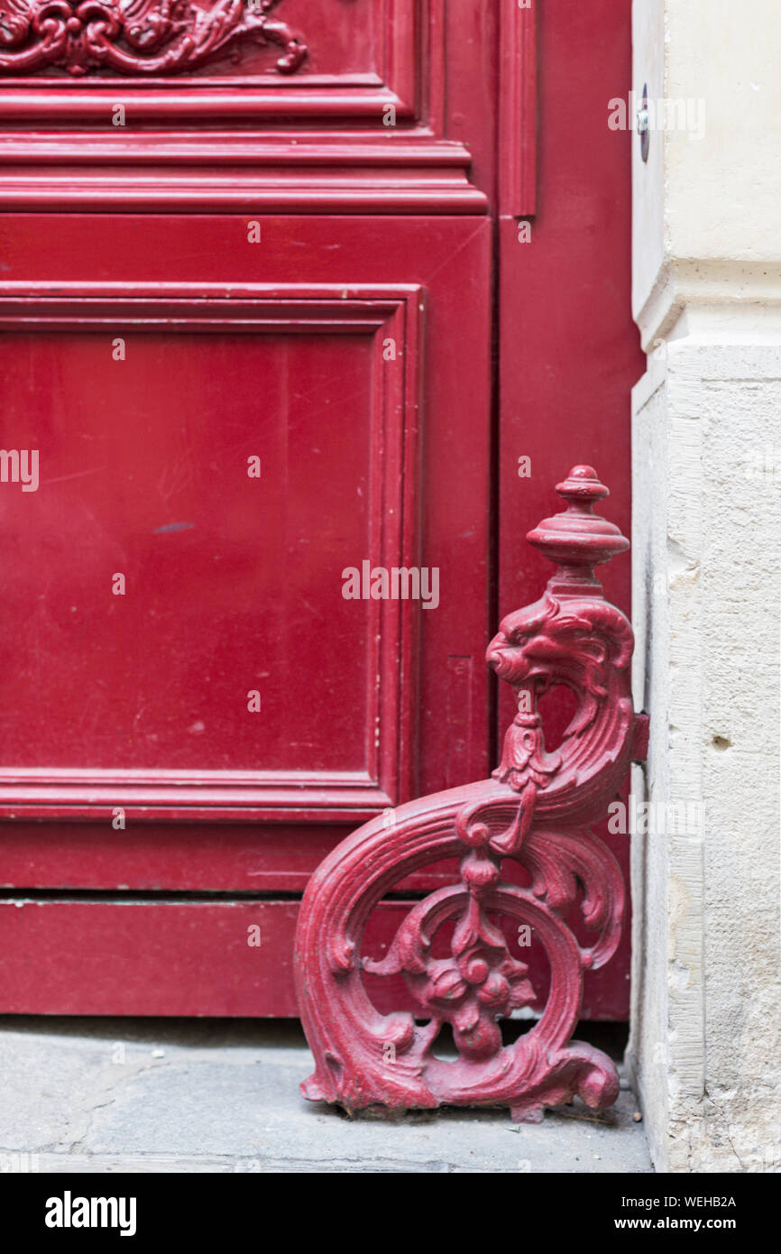 Details of ornate, red door in Paris, France Stock Photo - Alamy