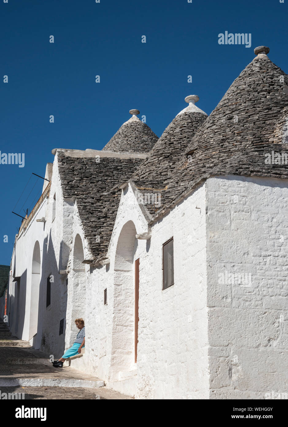 Traditional Trulli houses in the town of Alberobello, Puglia, Italy ...