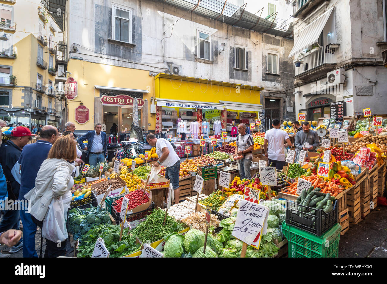 Fruit and vegetable stalls in the market on the Via Pignasecca on the ...