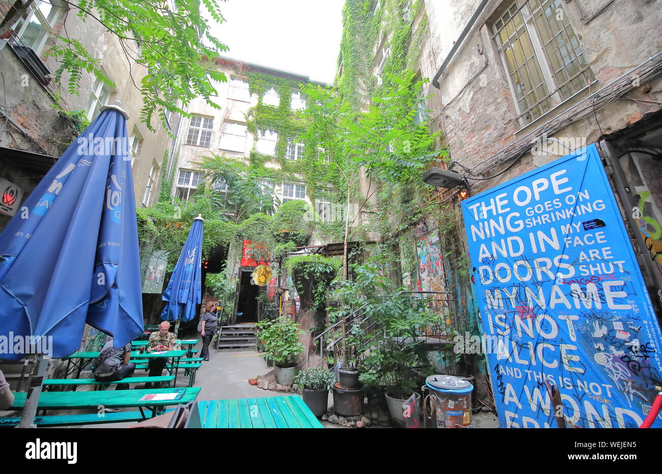 People visit Hackescher market street art alley Berlin Germany Stock ...
