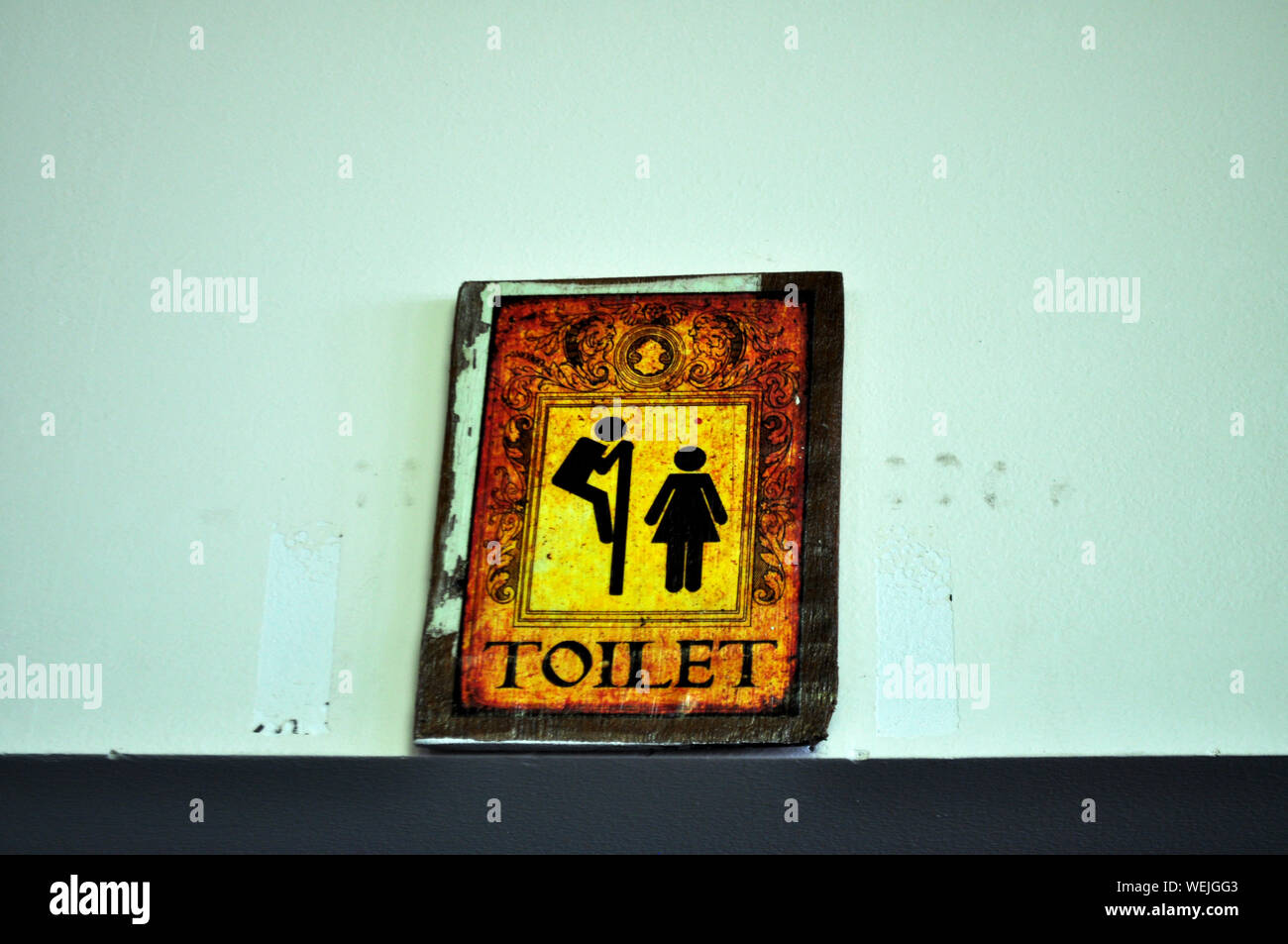 Old toilet sign hi-res stock photography and images - Alamy