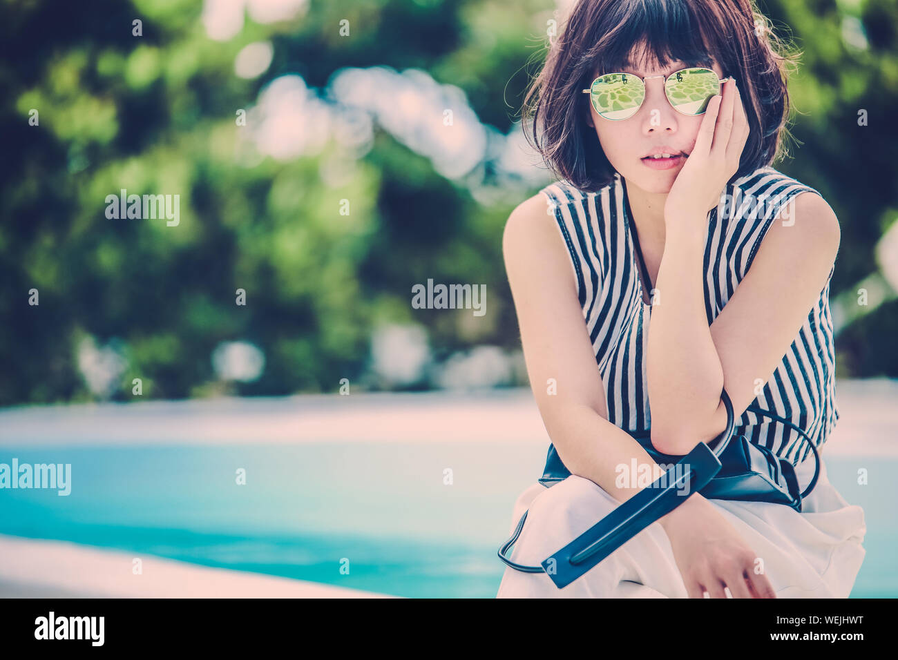 Sitting pool hi-res stock photography and images - Alamy