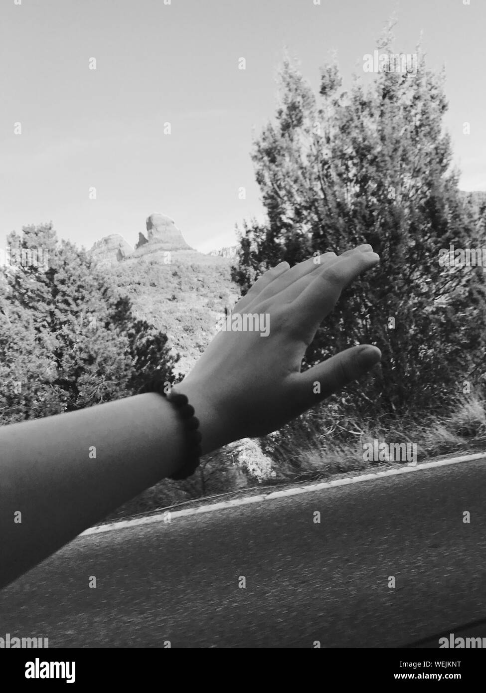 Reaching hand Black and White Stock Photos & Images - Alamy