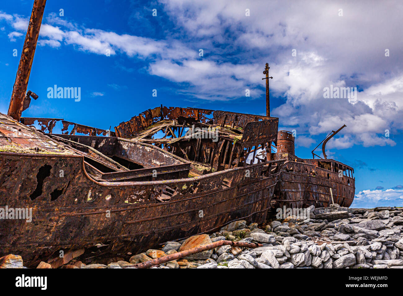 Stunning side view of the of the Plassey shipwreck on the rocky beach ...