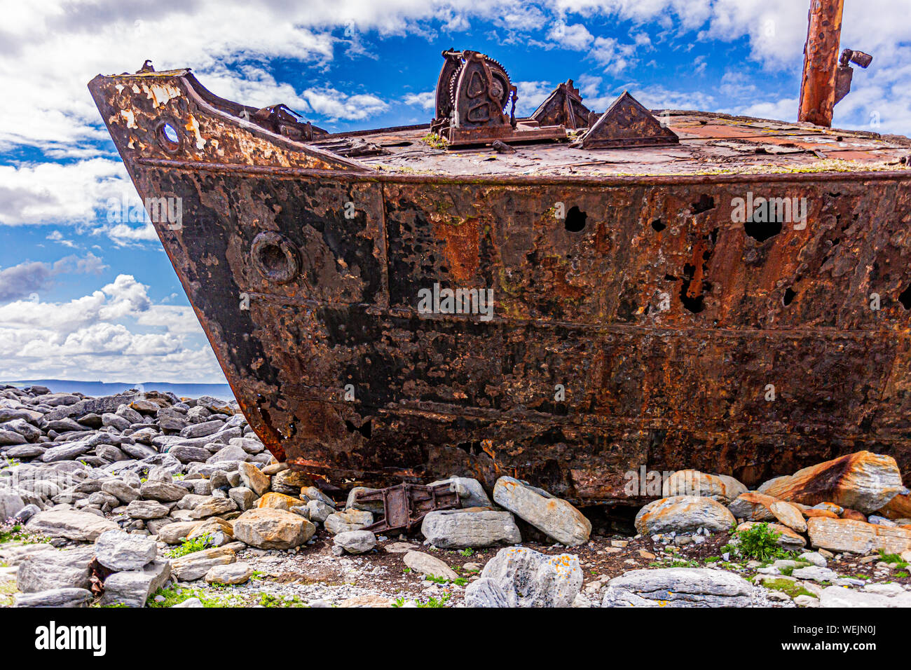 Blue sky with remains of ship wreck on the beach hi-res stock ...
