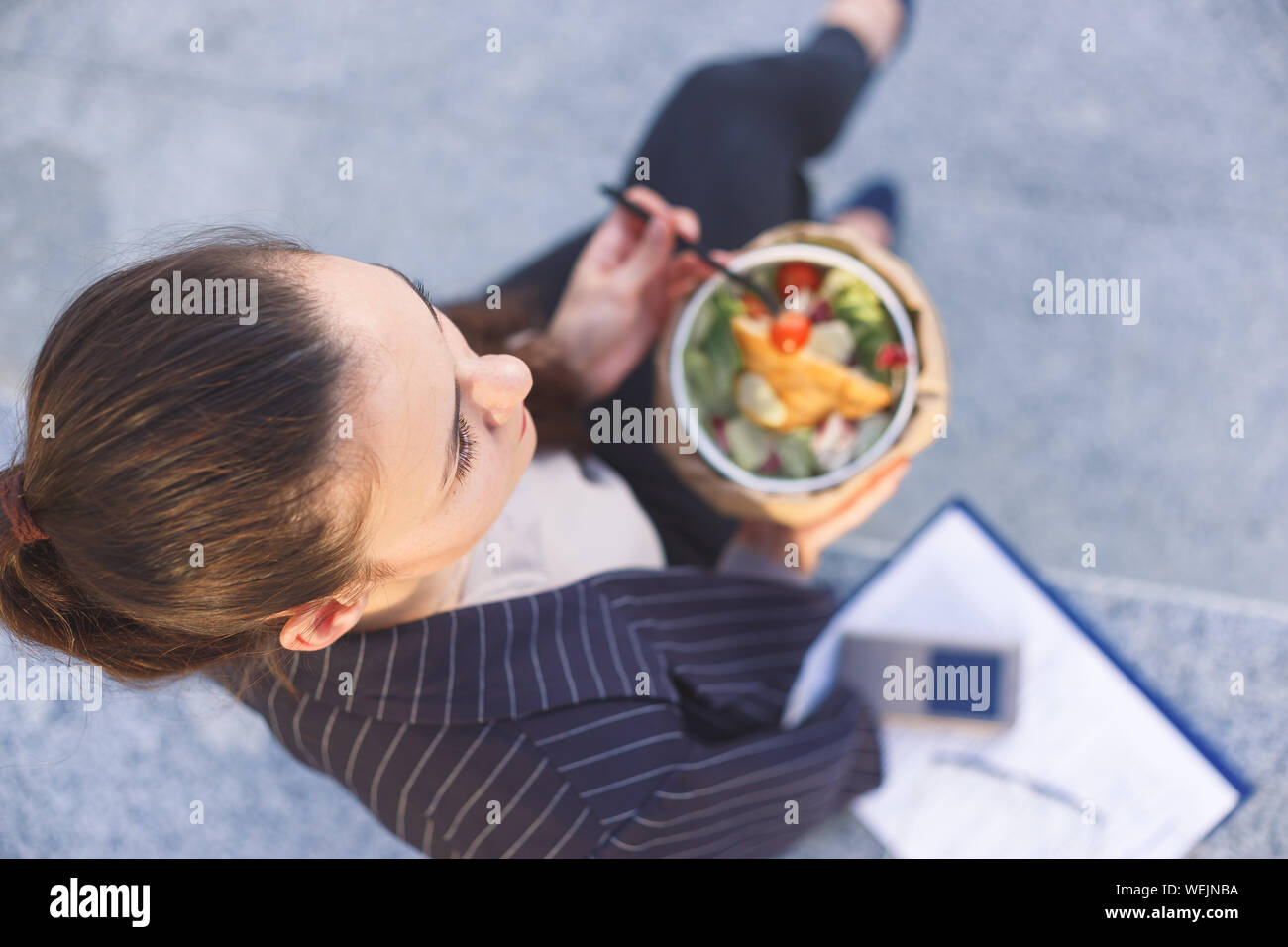 Woman worker eating hi-res stock photography and images - Alamy