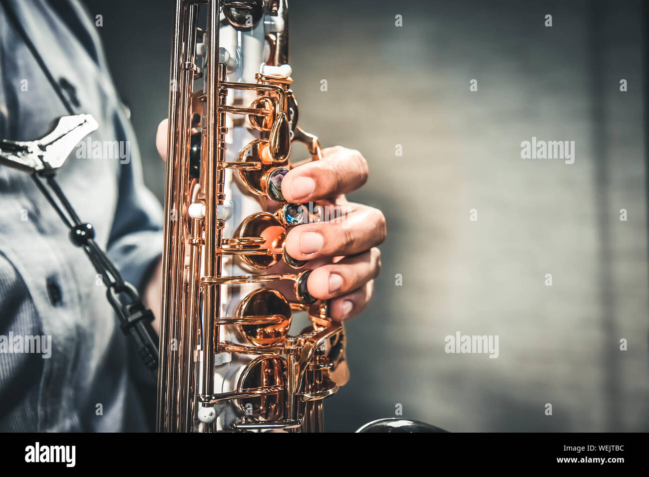 Playing instrument hi-res stock photography and images - Alamy