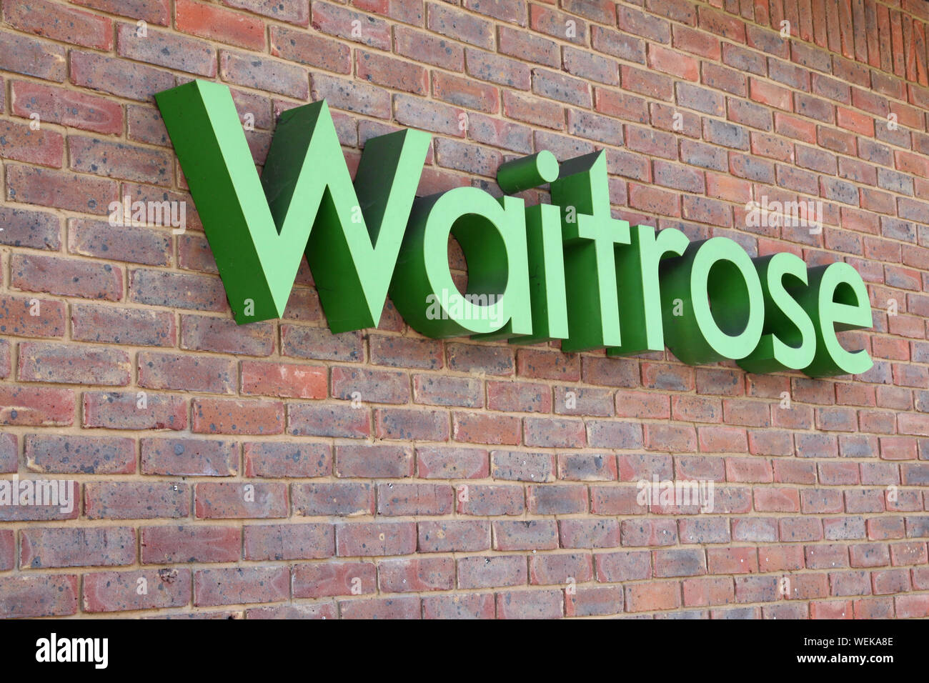 Banstead, Surrey, UK - Waitrose supermarket exterior external signage ...