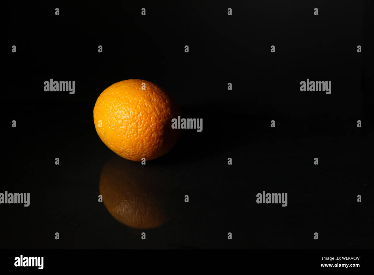 Dimples in skin of orange hi-res stock photography and images - Alamy