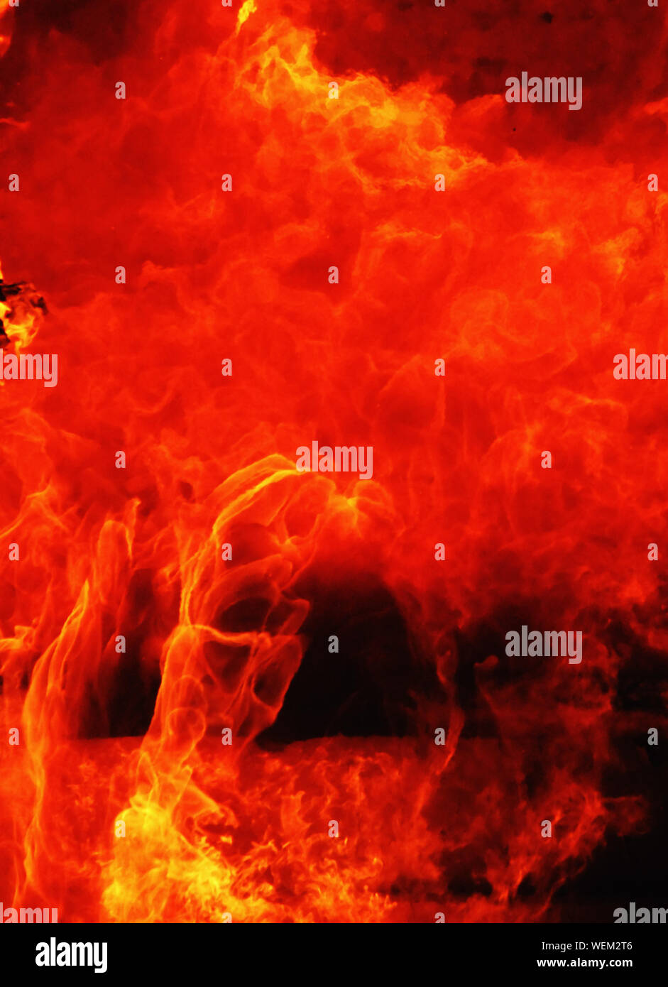 background of fire as a symbol of hell and eternal torment Stock Photo ...