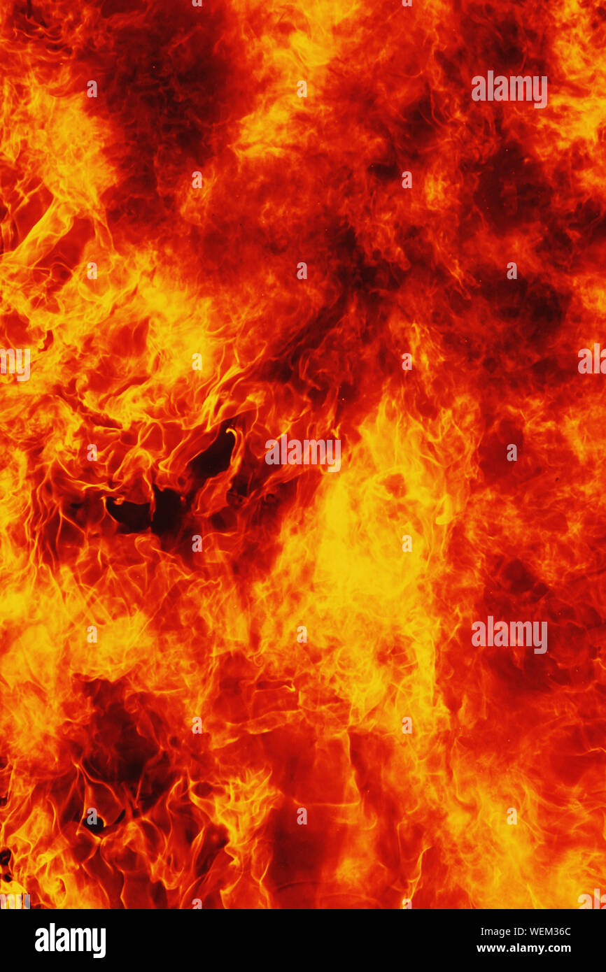 background of fire as a symbol of hell and eternal torment Stock Photo ...